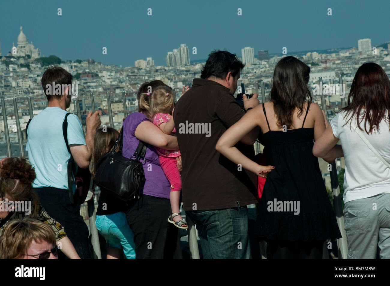 Medium Crowd Adult Tourists Looking at cityscape with people from ...