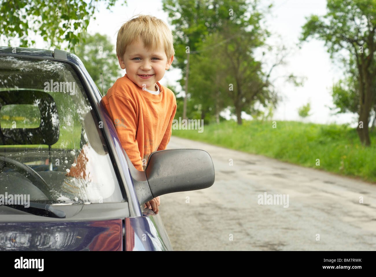 Boy boys male kids children steering wheel hi-res stock photography and ...