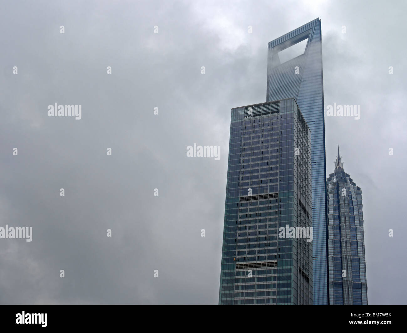 Group of skyscrapers in a rainy misty autumn Shanghai, China Stock ...