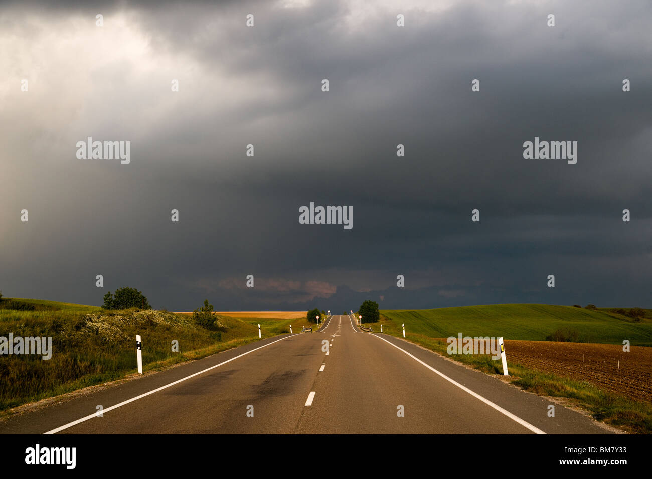 Country road before a rain Stock Photo - Alamy