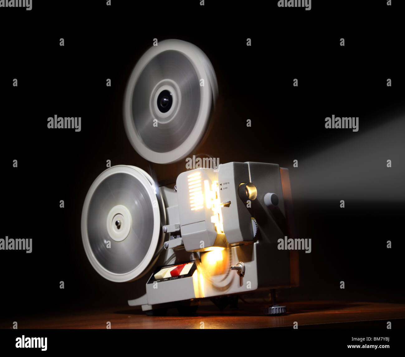 old projector showing the film in dusk Stock Photo - Alamy