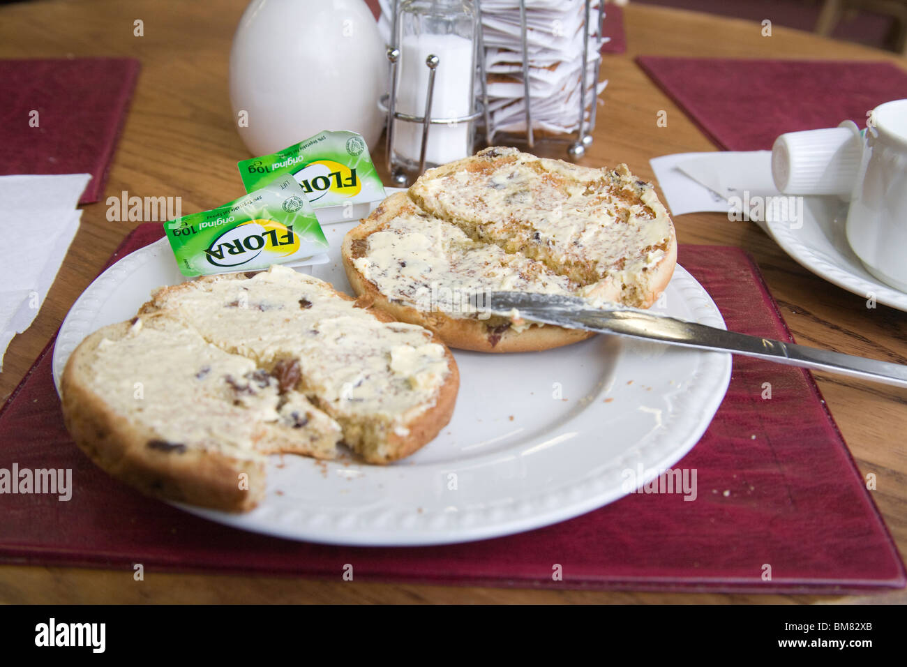 Close up Toasted teacake spread with Flora margarine Stock Photo - Alamy