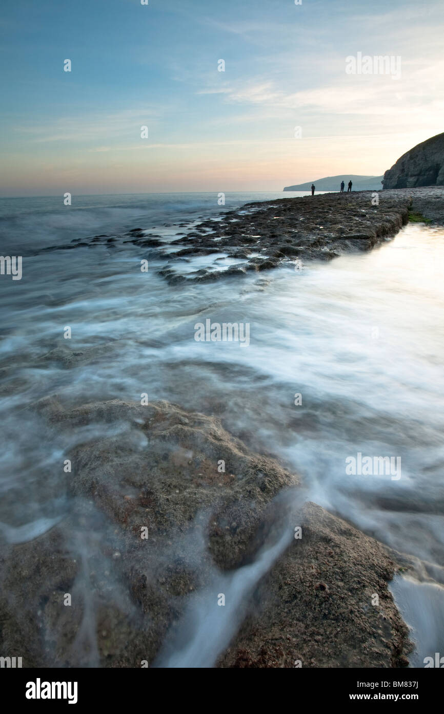 Anglers fishing from Dancing Ledge at sunset, Swanage, Dorset, Uk Stock ...