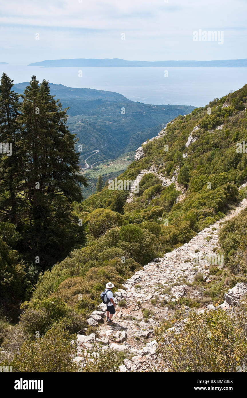 A walker on the Bilovas path, between the villages of Sotirianika and ...