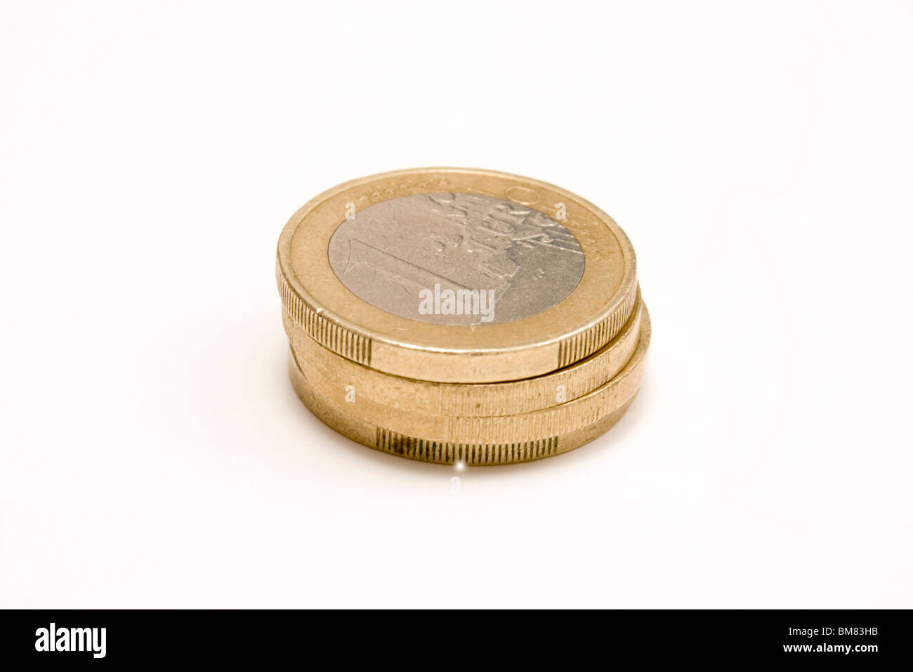 One euro coins isolated on white background Stock Photo - Alamy