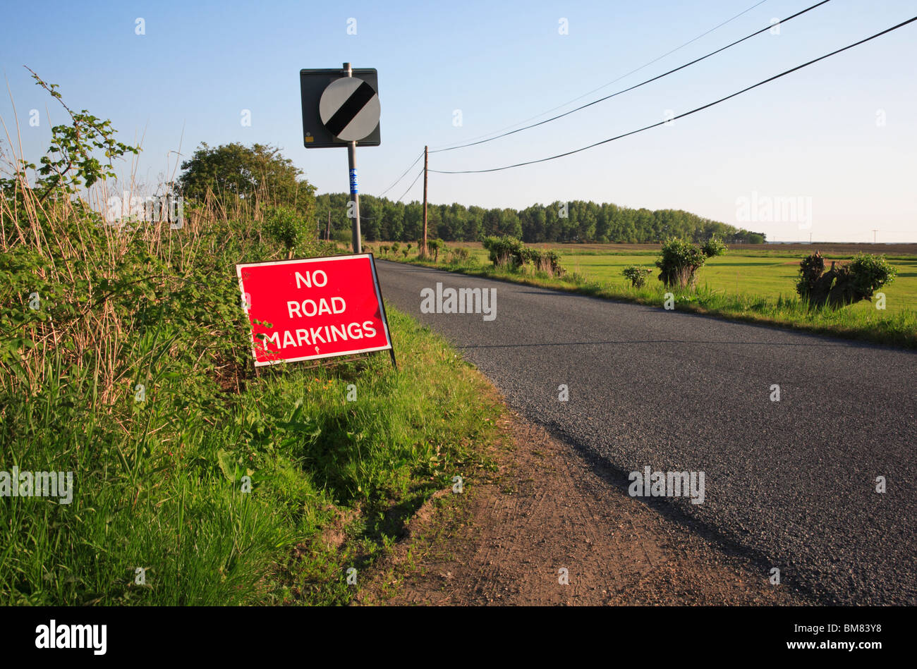 Road signs by a freshly resurfaced road at West Somerton, Norfolk ...
