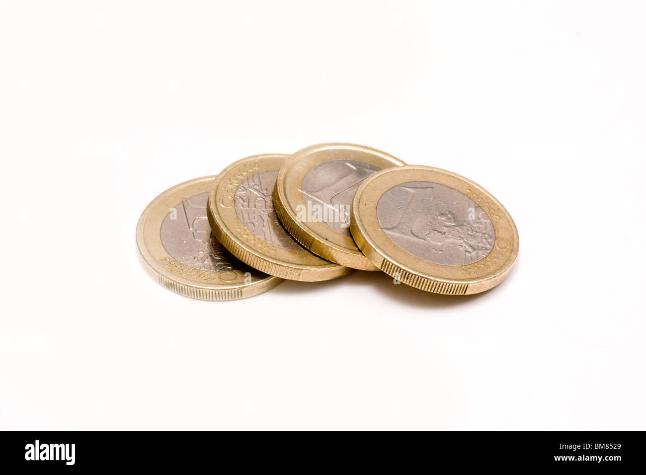 One euro coins isolated on white background Stock Photo - Alamy