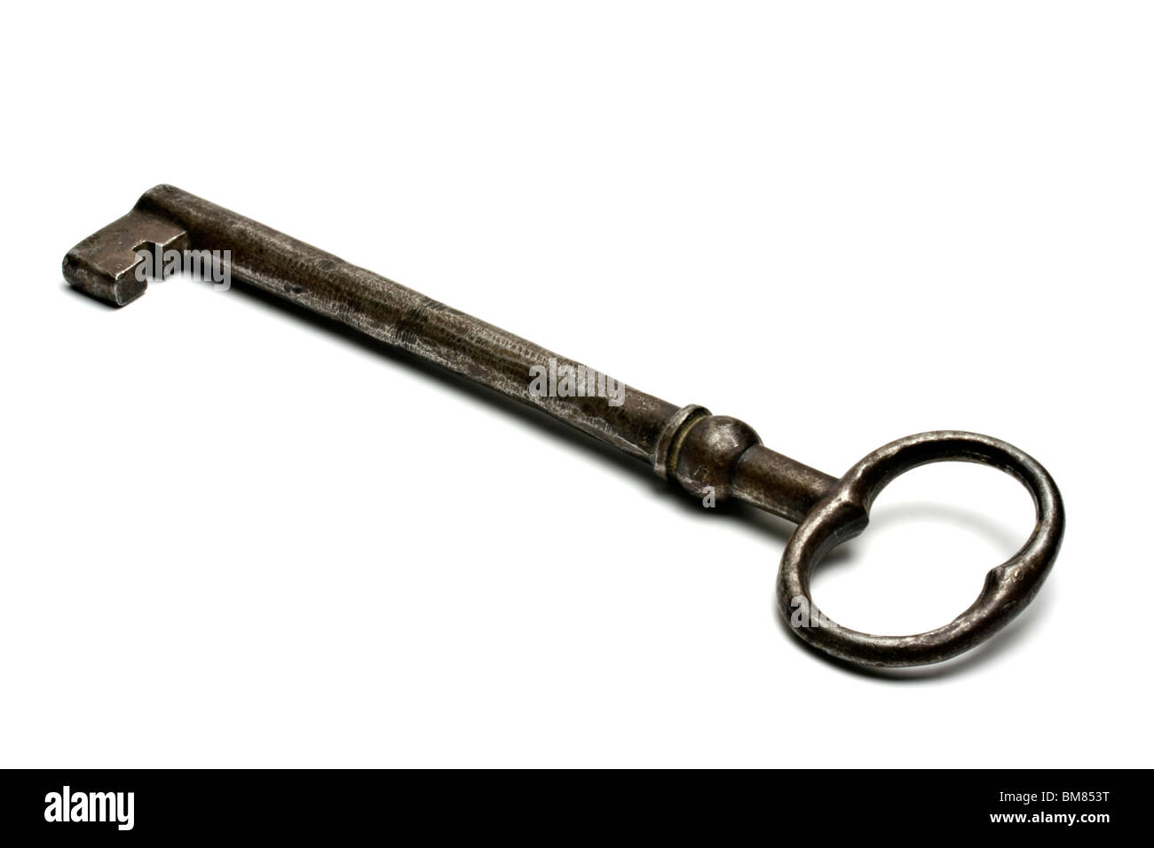 Old key isolated on white background Stock Photo - Alamy
