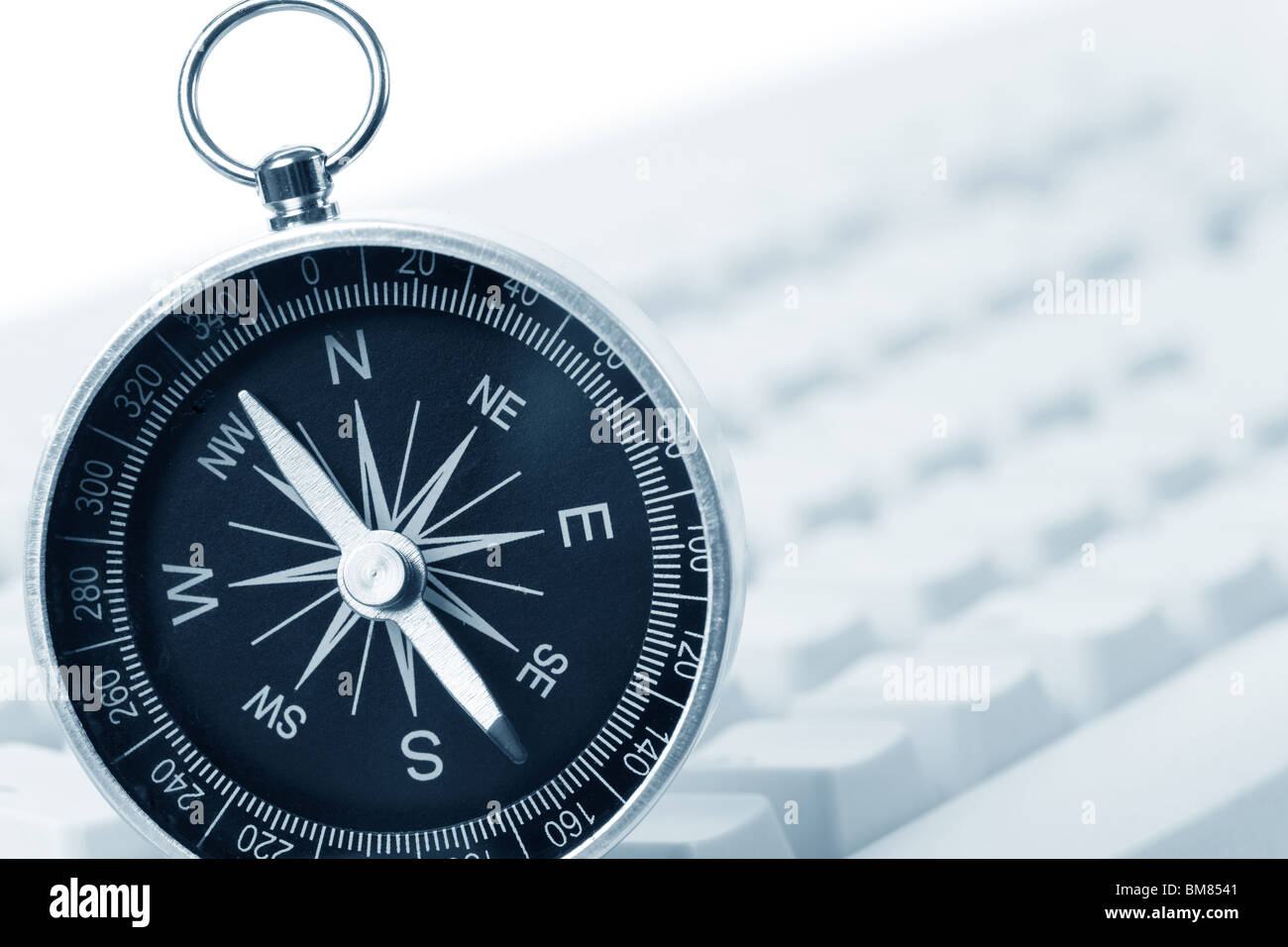 Computer Keyboard and Compass, internet concept Stock Photo - Alamy