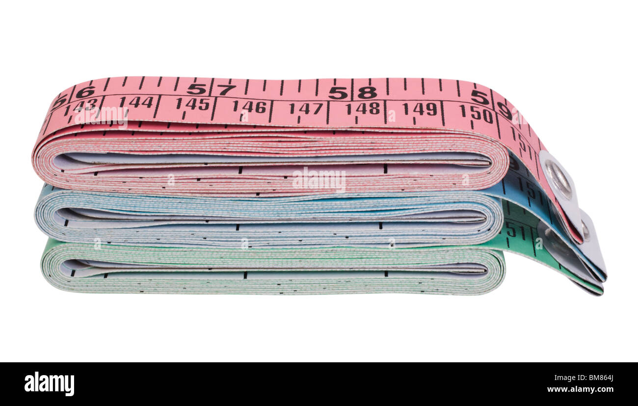 Close-up of a stack of tape measures Stock Photo - Alamy