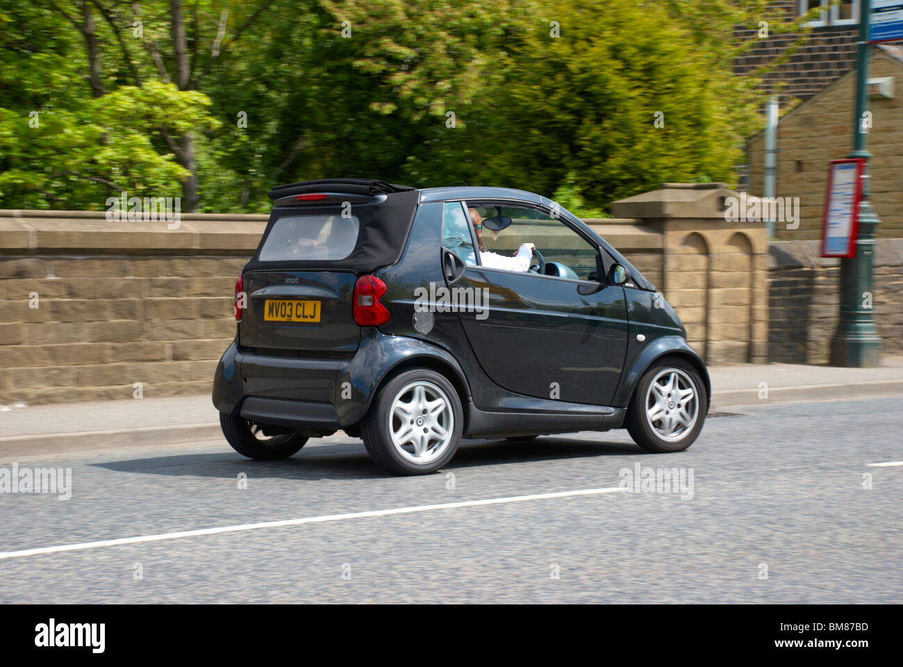 Car driving over a bridge Stock Photo - Alamy
