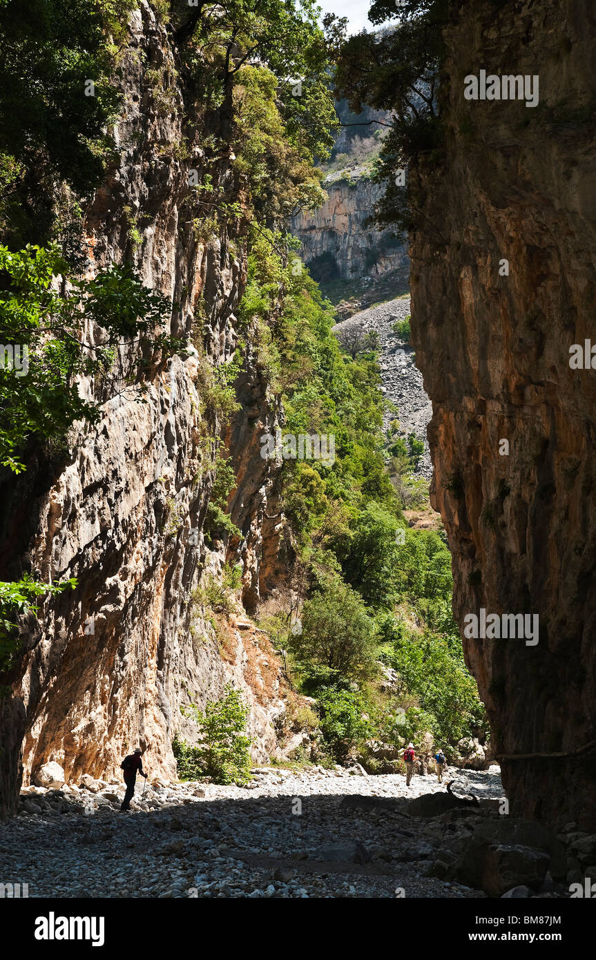 Walkers in the Ridomo Gorge. In the Taygetos mountains, Outer Mani ...