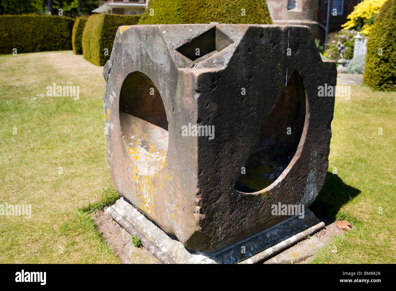 Solid stone sundial Stock Photo - Alamy