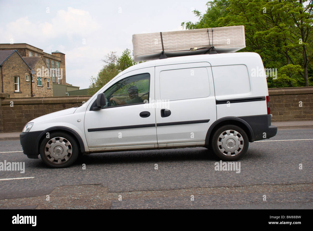 White van on the road Stock Photo - Alamy