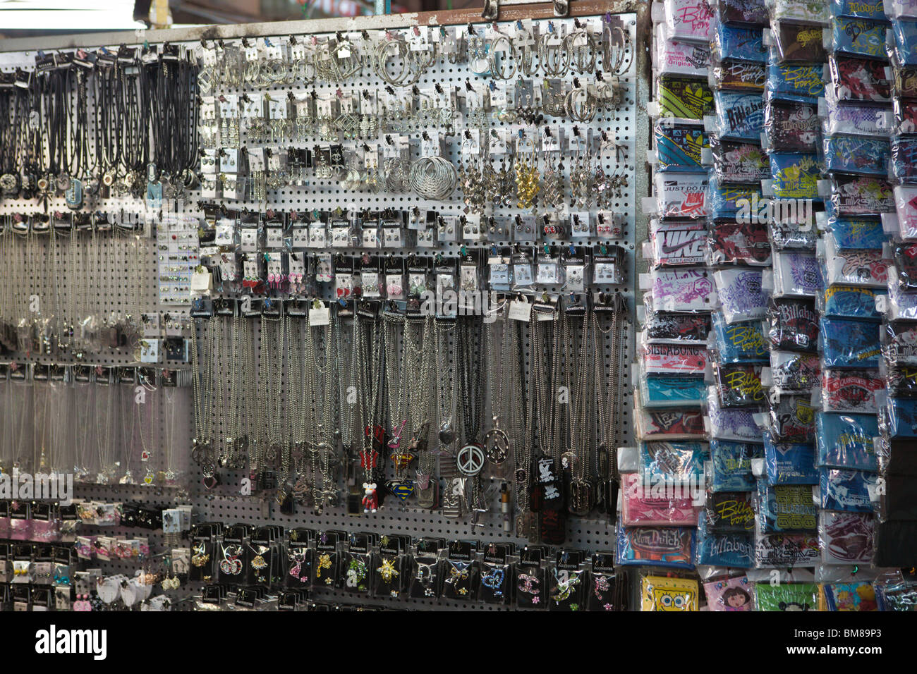Trinkets for sale at a stall in Chinatown Kuala Lumpur Stock Photo - Alamy