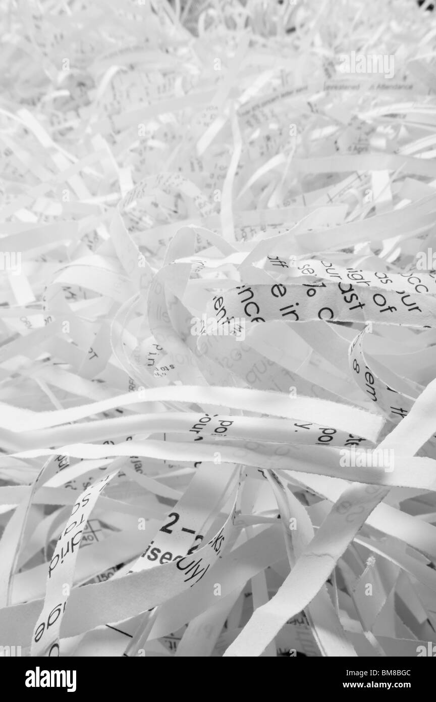 Shredded documents waste paper inside thin transparent plastic bag ...