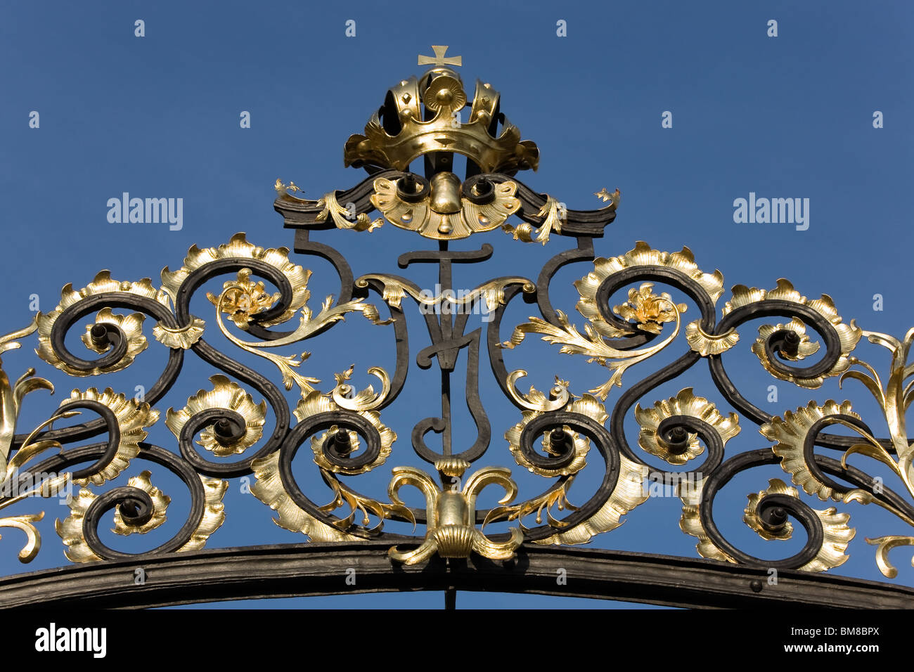 Decoration detail of golden plated metal Matthias gate on Prague castle ...