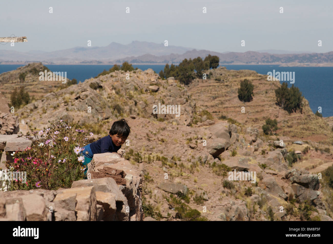 Smiling child, Isla Taquile, Lake Titicaca, Puno, Peru Stock Photo - Alamy