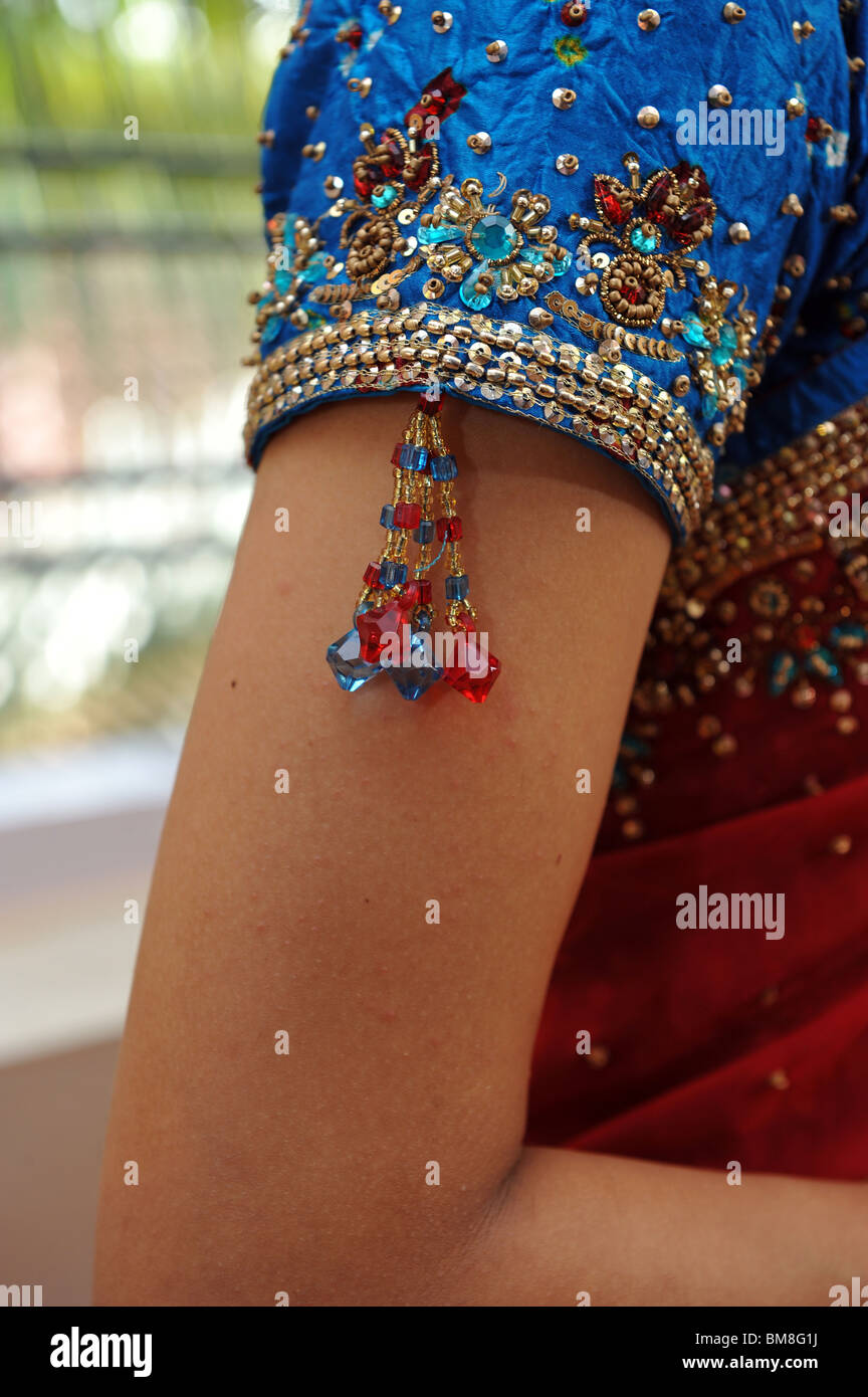 profile view of a bride's hand wearing designer dress Stock Photo - Alamy