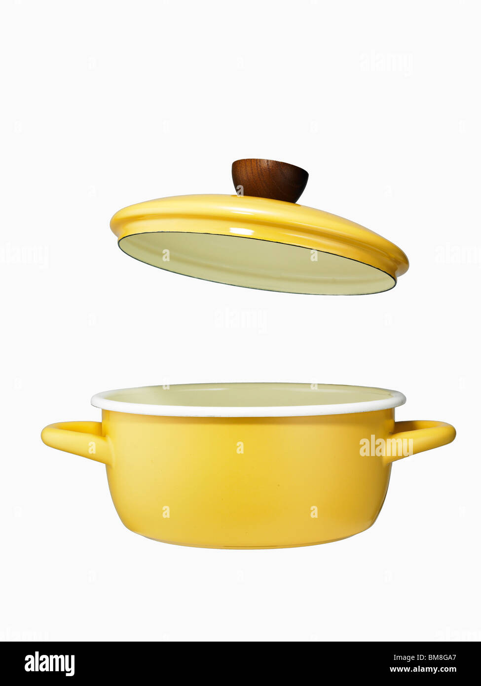 Yellow pot with open lid Stock Photo - Alamy