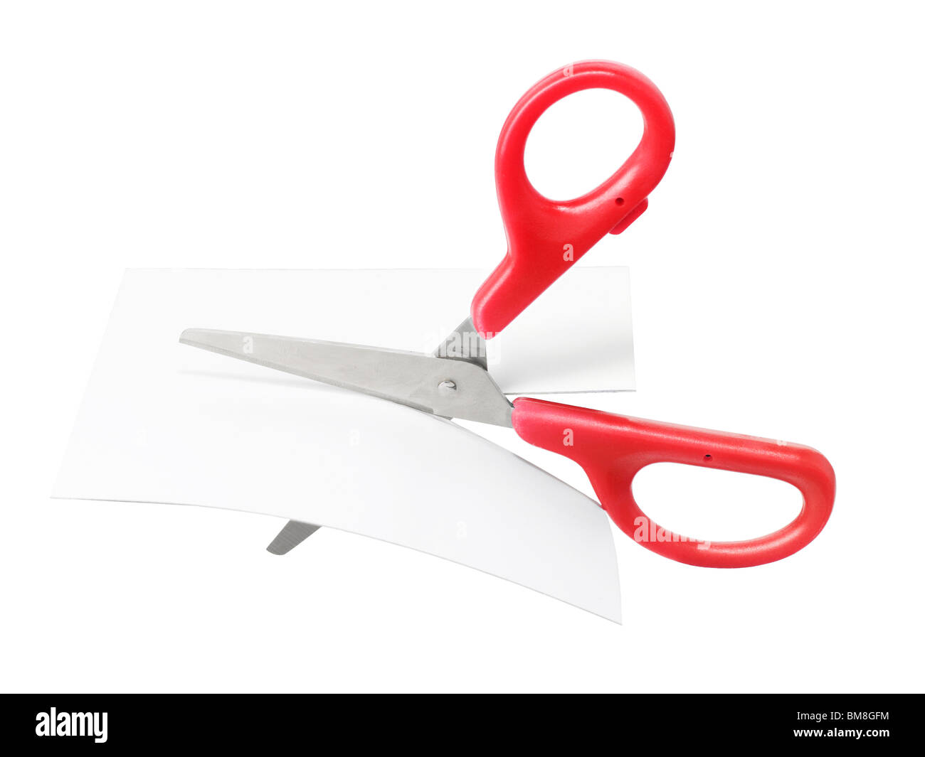 Scissors cutting paper, white background Stock Photo - Alamy