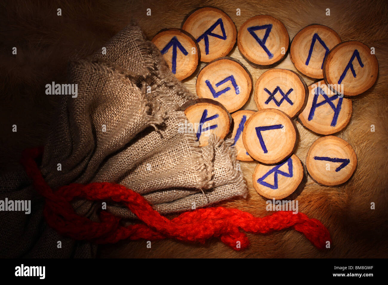 Handmade rune set with pouch in the dark Stock Photo - Alamy
