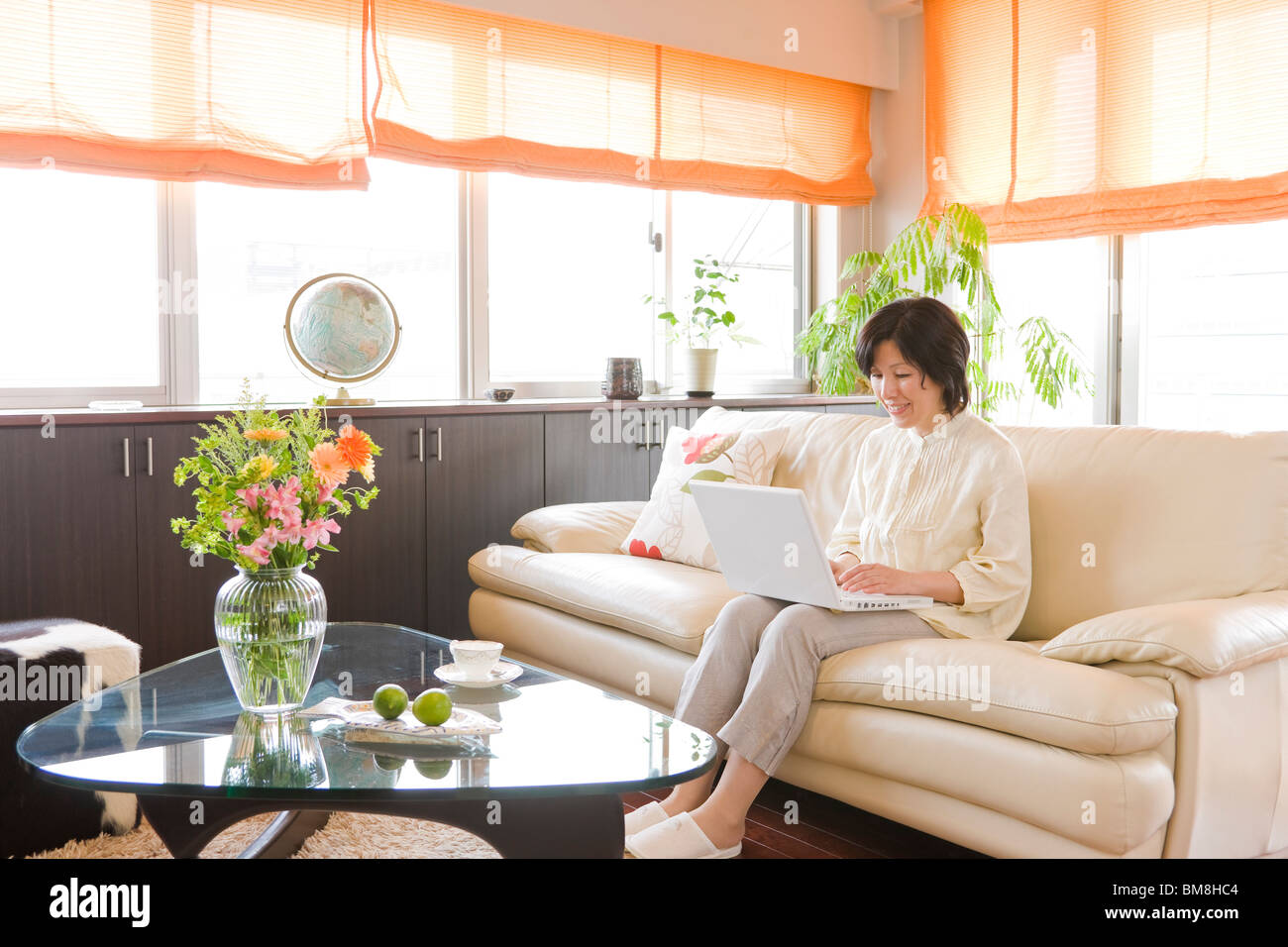 Woman using table pc hi-res stock photography and images - Alamy