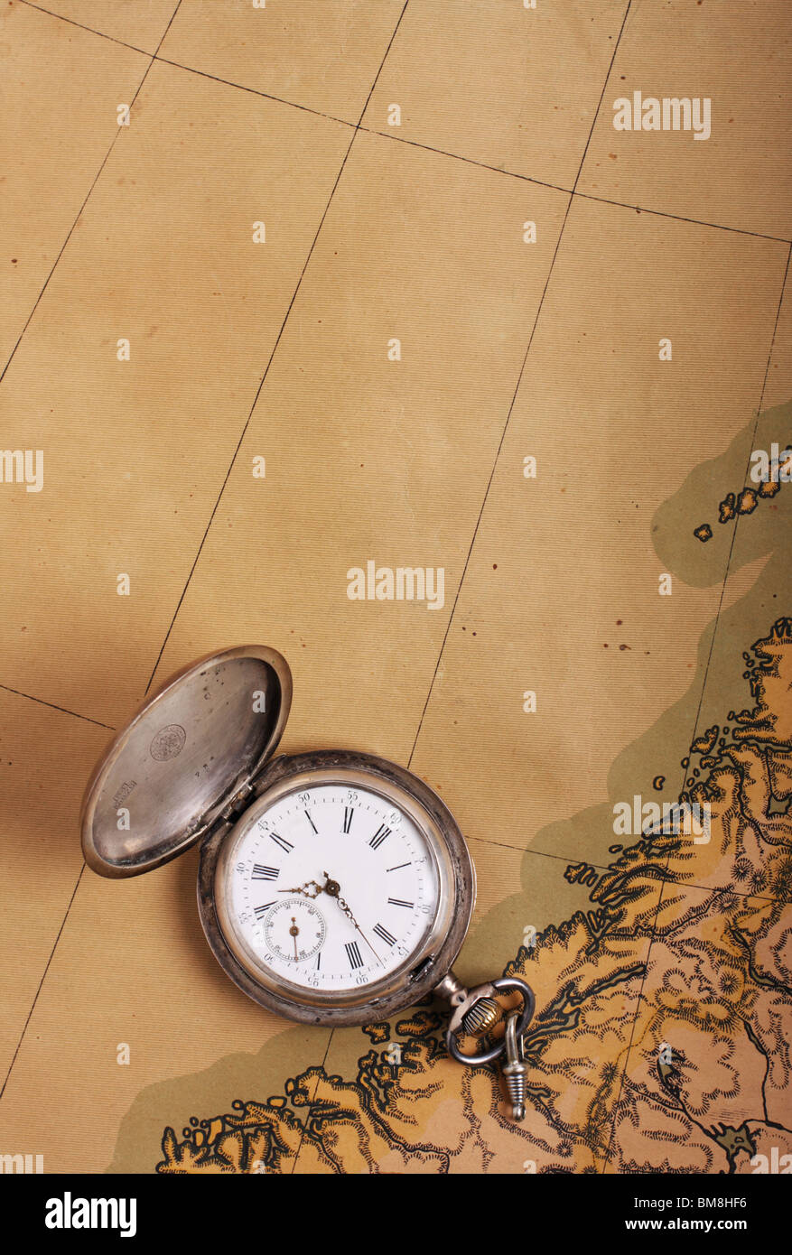 Old silver pocket watch on ancient map Stock Photo - Alamy