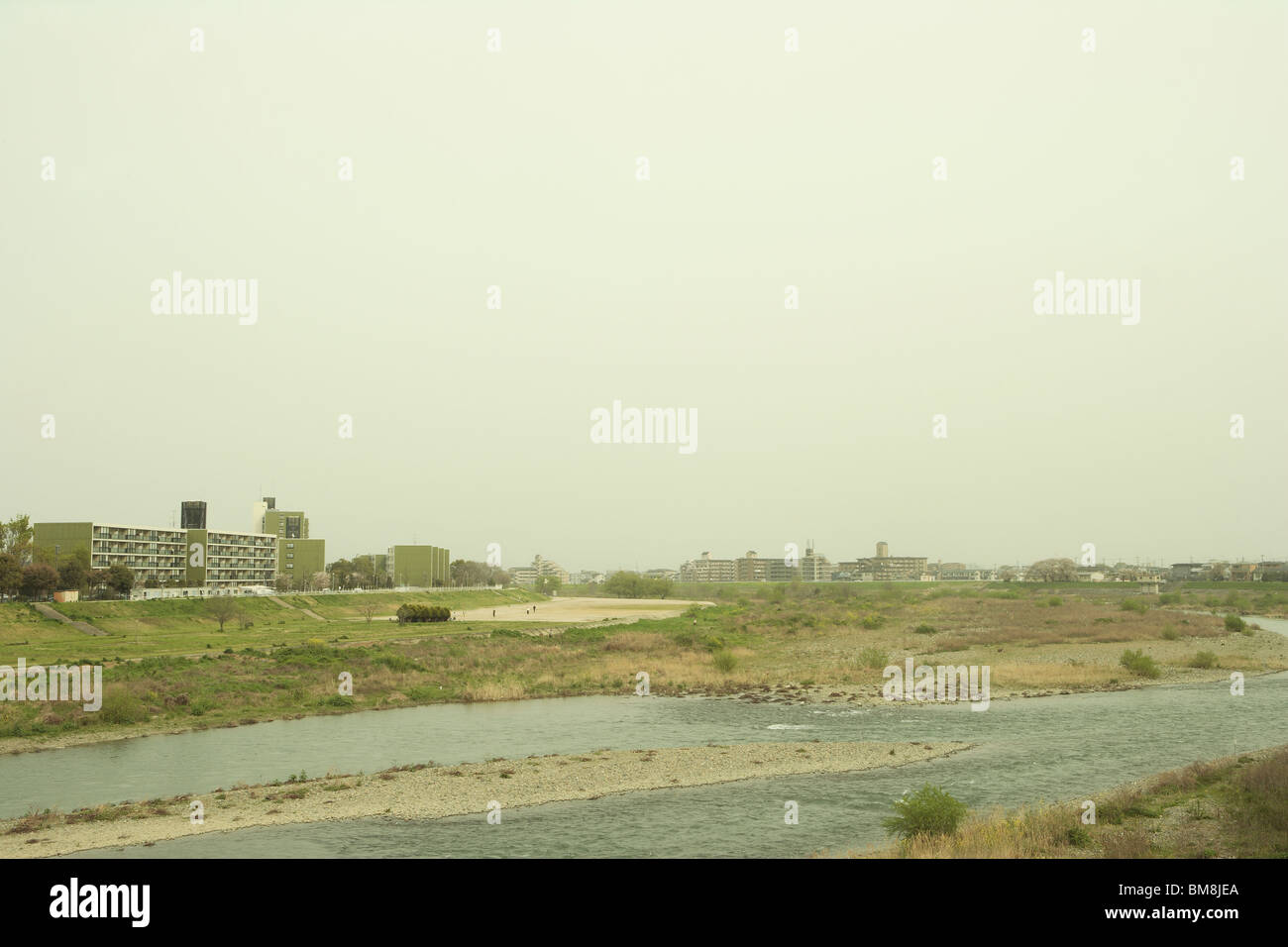 River and apartment buildings, Kyoto Prefecture, Honshu, Japan Stock ...