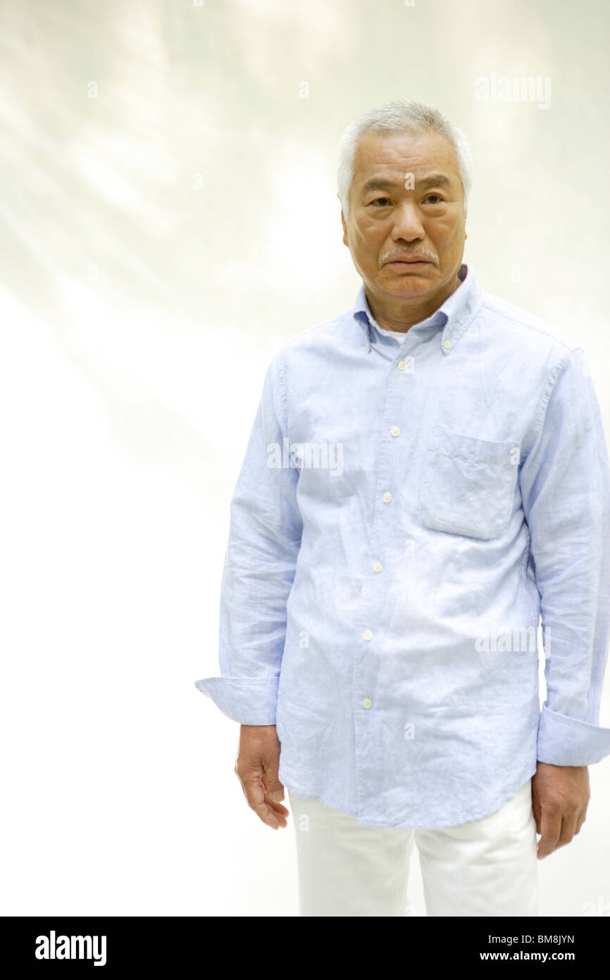 Portrait of senior man, white background Stock Photo - Alamy