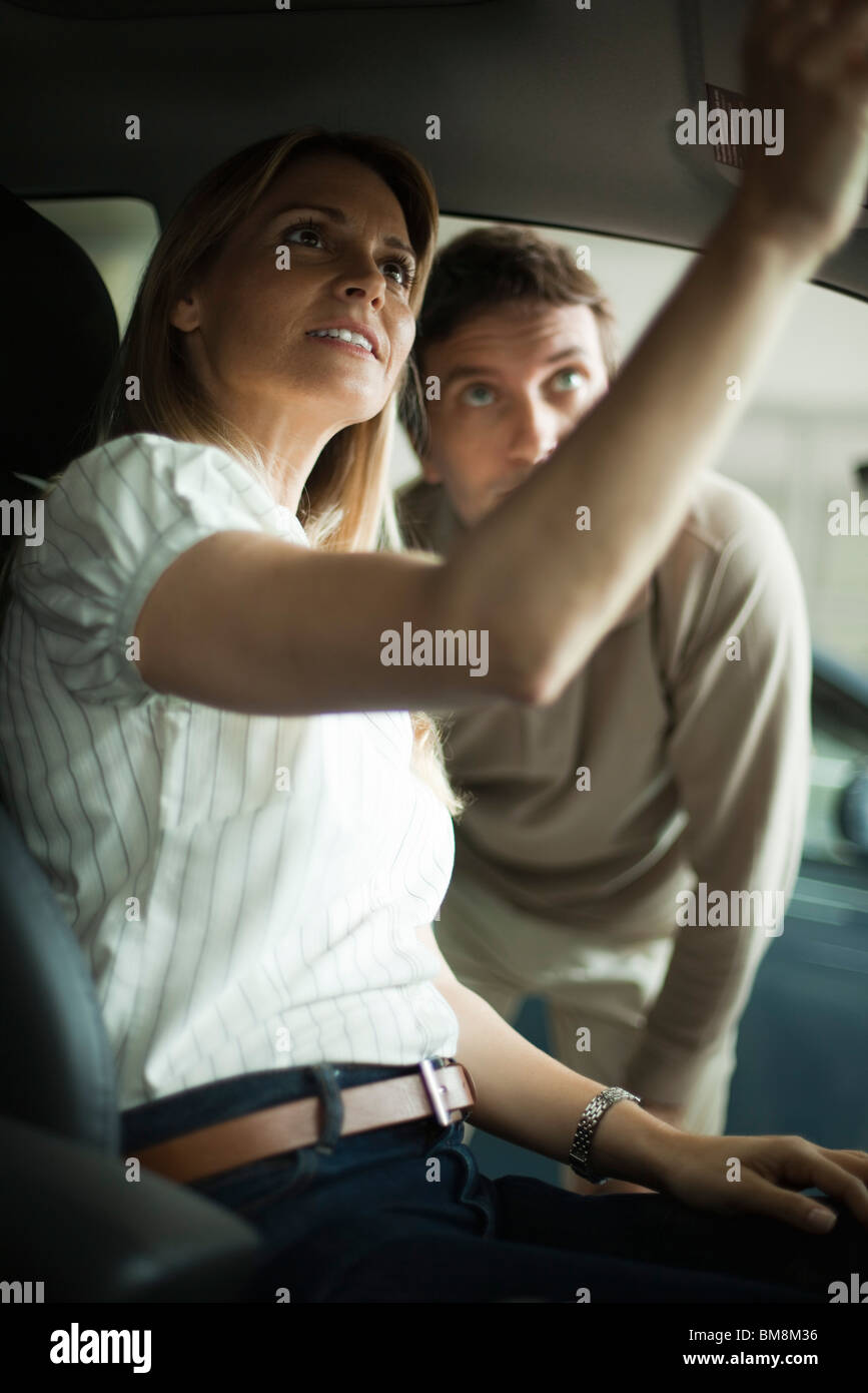 Couple checking out new car hi-res stock photography and images - Alamy