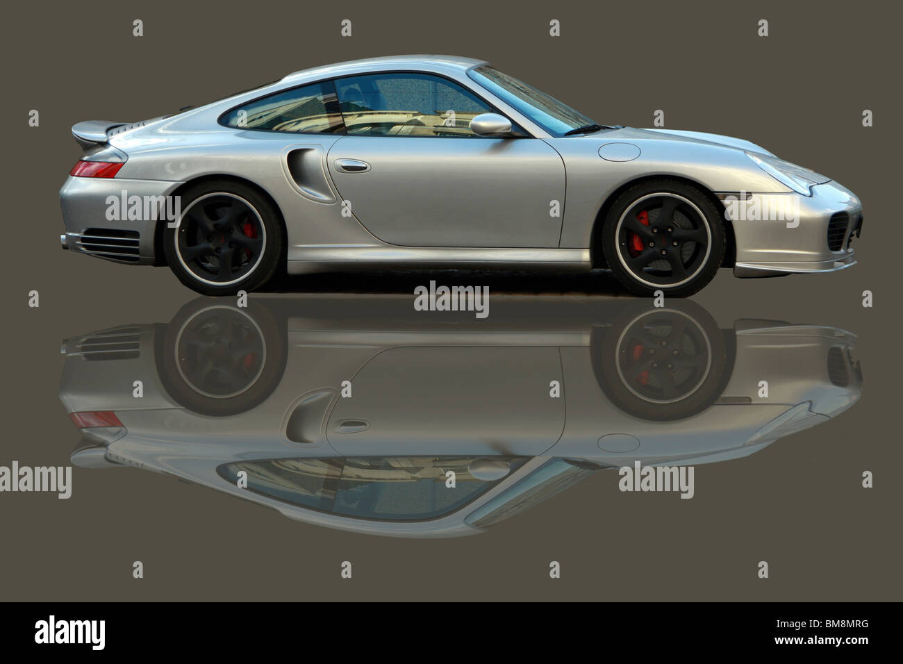 Porche 911 Turbo side view with reflection Stock Photo - Alamy