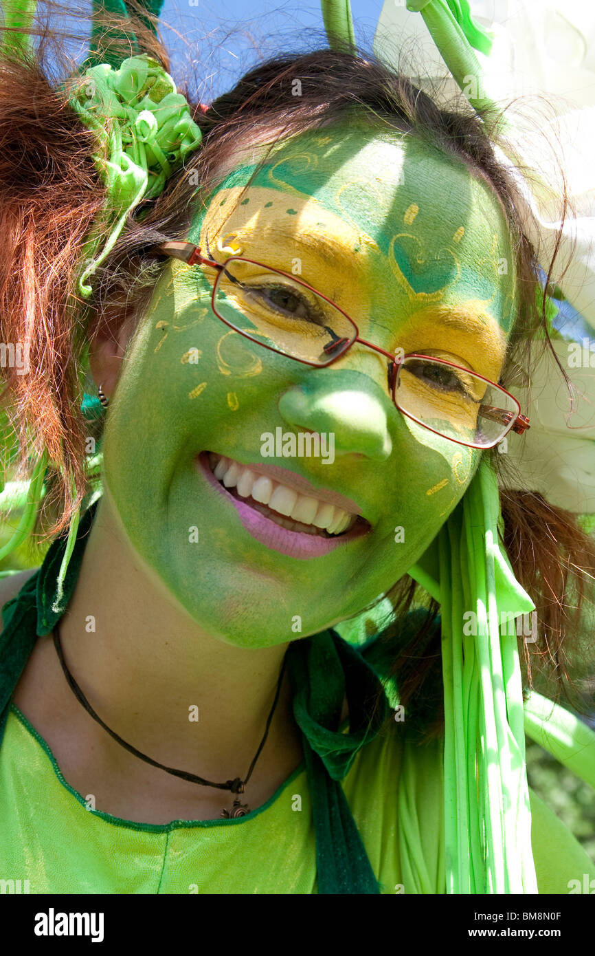 Young woman with face painted green, made up like a tree Stock Photo ...