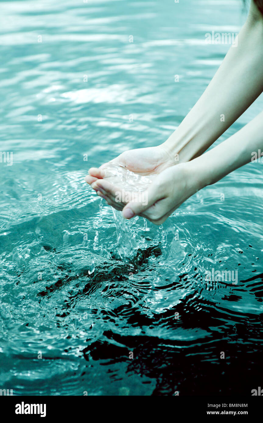 Hands scooping water hi-res stock photography and images - Alamy