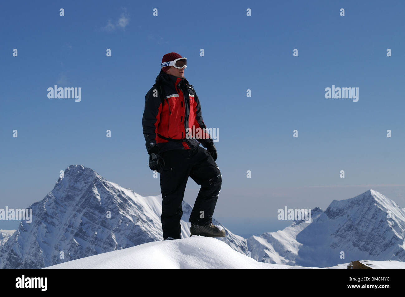 Man standing on the Alpine summit. Switzerland Stock Photo - Alamy