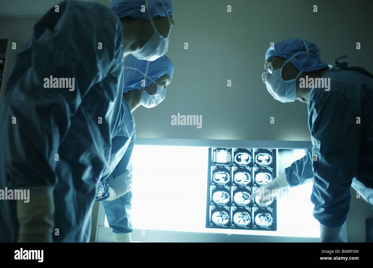 Surgeons discussing X-rays Stock Photo - Alamy