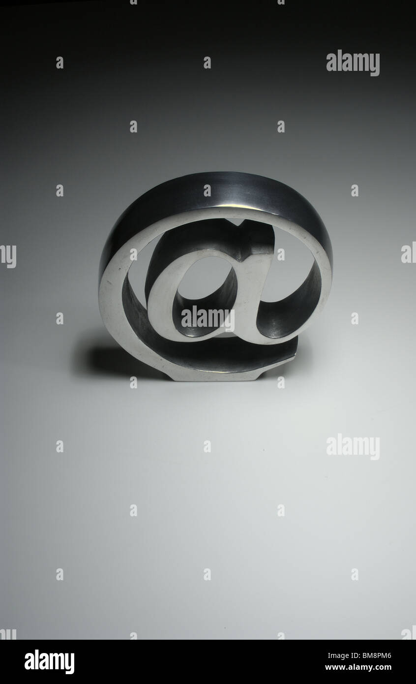 Metal at symbol, black background Stock Photo - Alamy