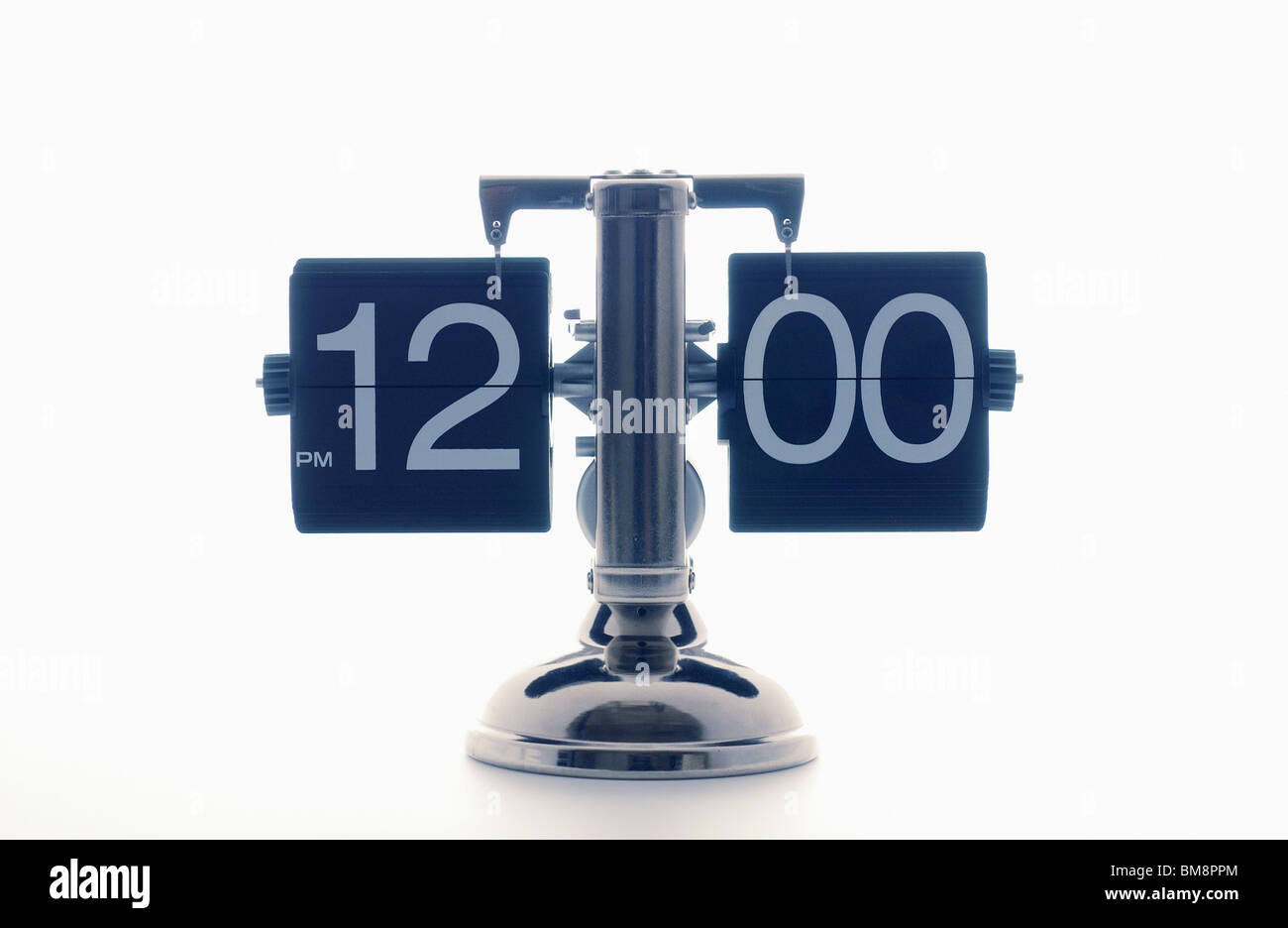 Clock showing 12 o'clock, white background Stock Photo - Alamy