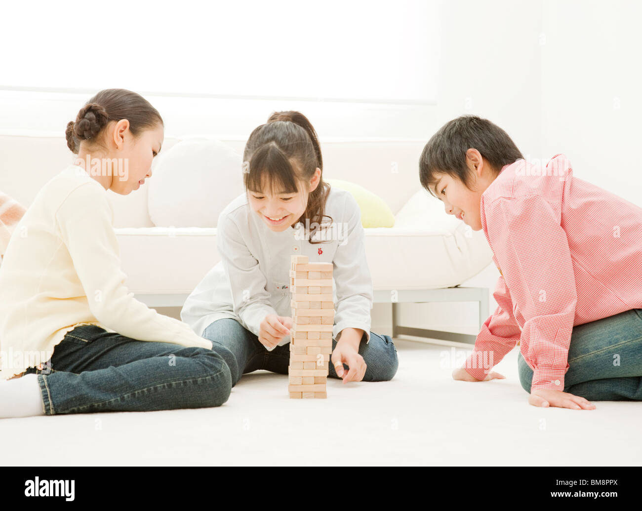 Friends playing jenga High Resolution Stock Photography and Images - Alamy