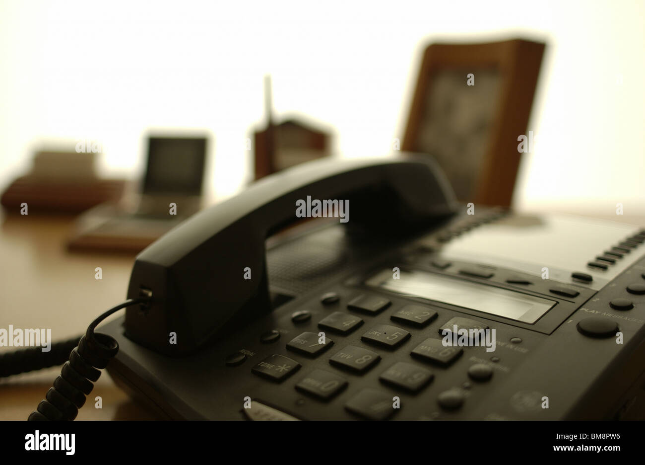 Telephone on desk in office, close up, differential focus Stock Photo ...