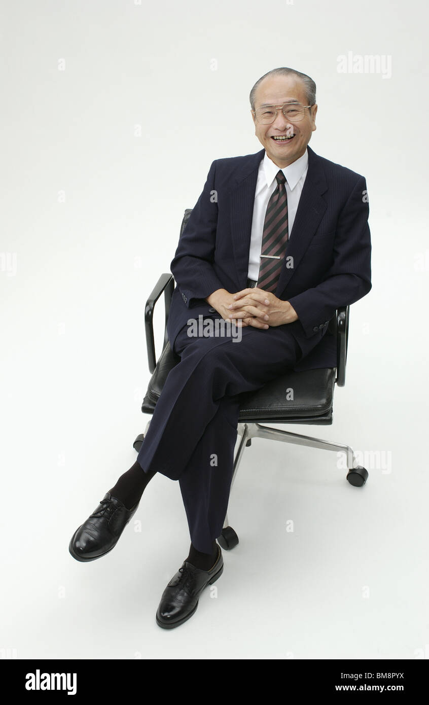 Portrait of Senior Man in Business Suit Stock Photo - Alamy