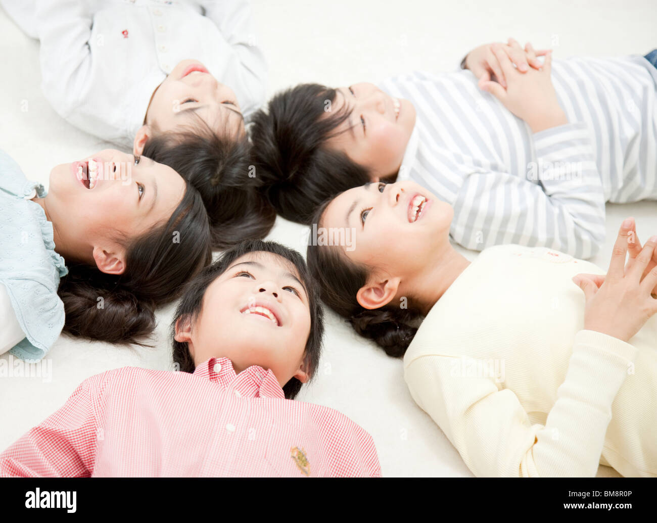 Boy laying on back hi-res stock photography and images - Alamy