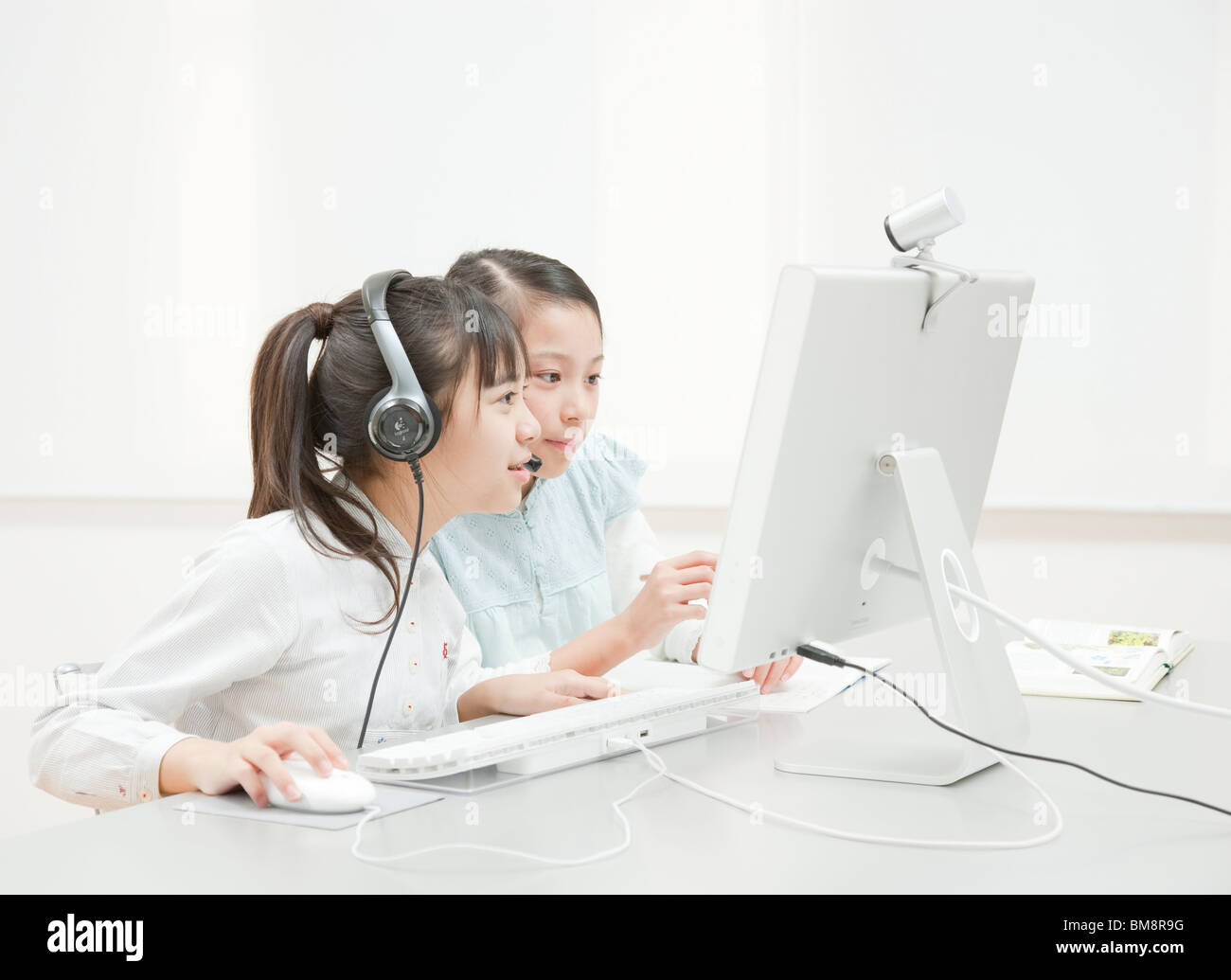 Girls Studying at Desk, Desktop Computer on the Desk Stock Photo - Alamy