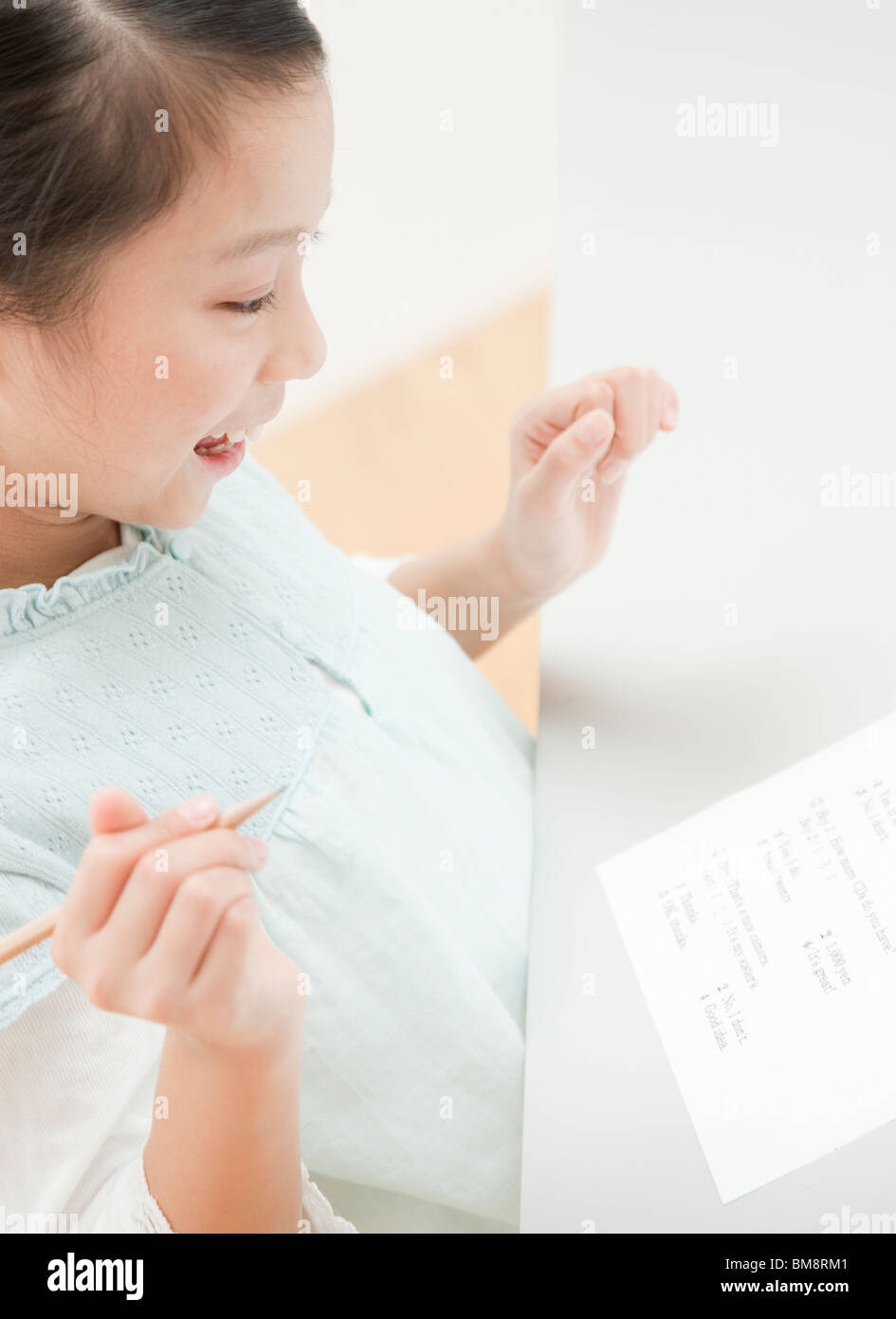 A Girl Studying at Desk Stock Photo - Alamy