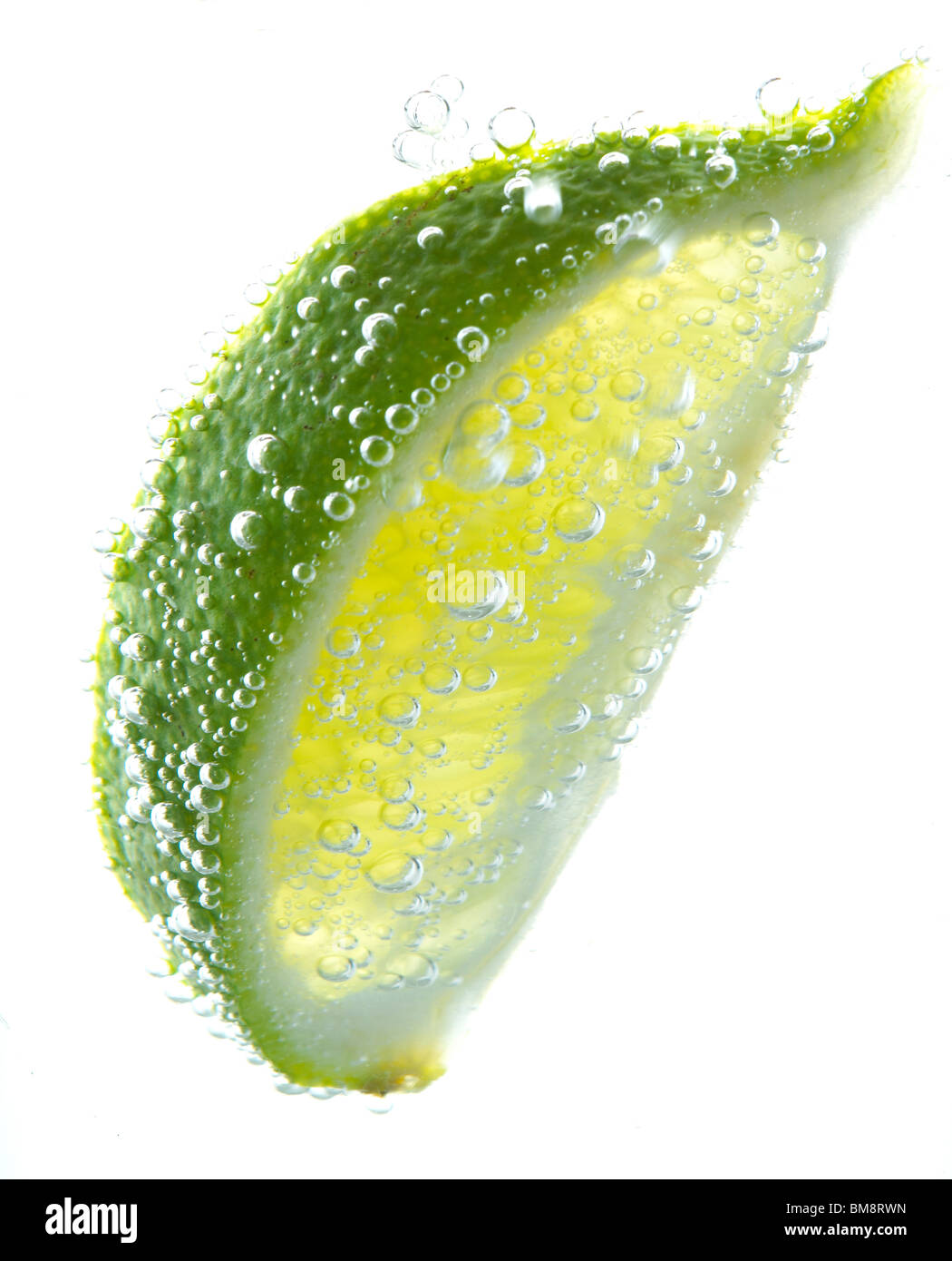 Lime in Carbonated Water Stock Photo - Alamy