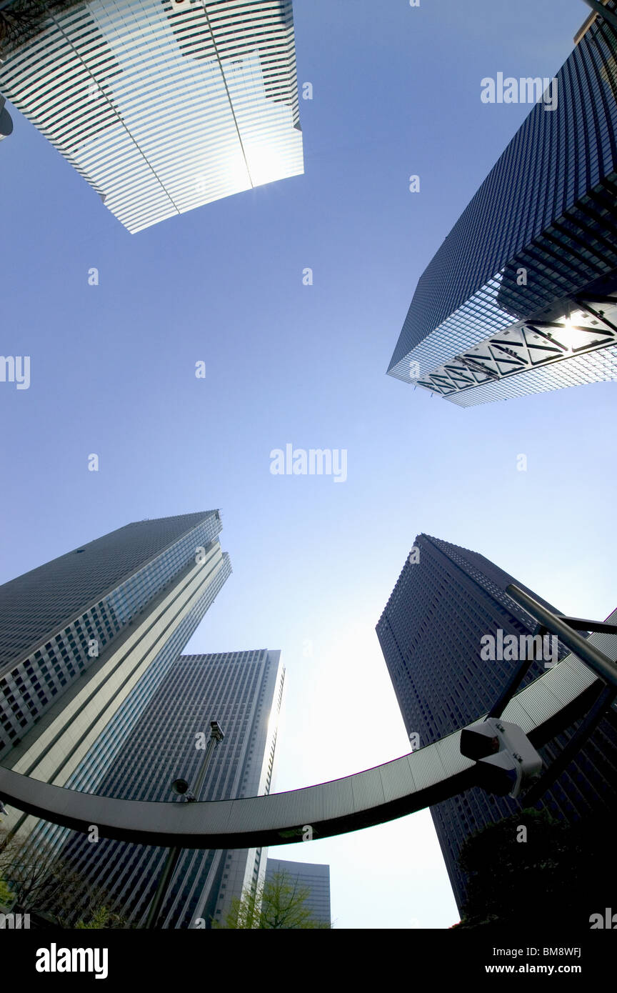 Office buildings under blue sky, fish-eye lens, Tokyo prefecture, Japan ...