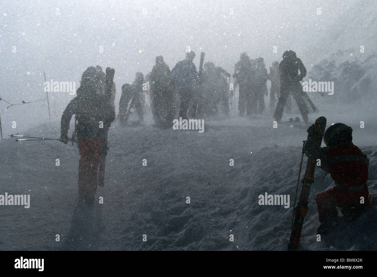 Very strong, sudden and unexpected blizzard in Alps, group of skiers ...