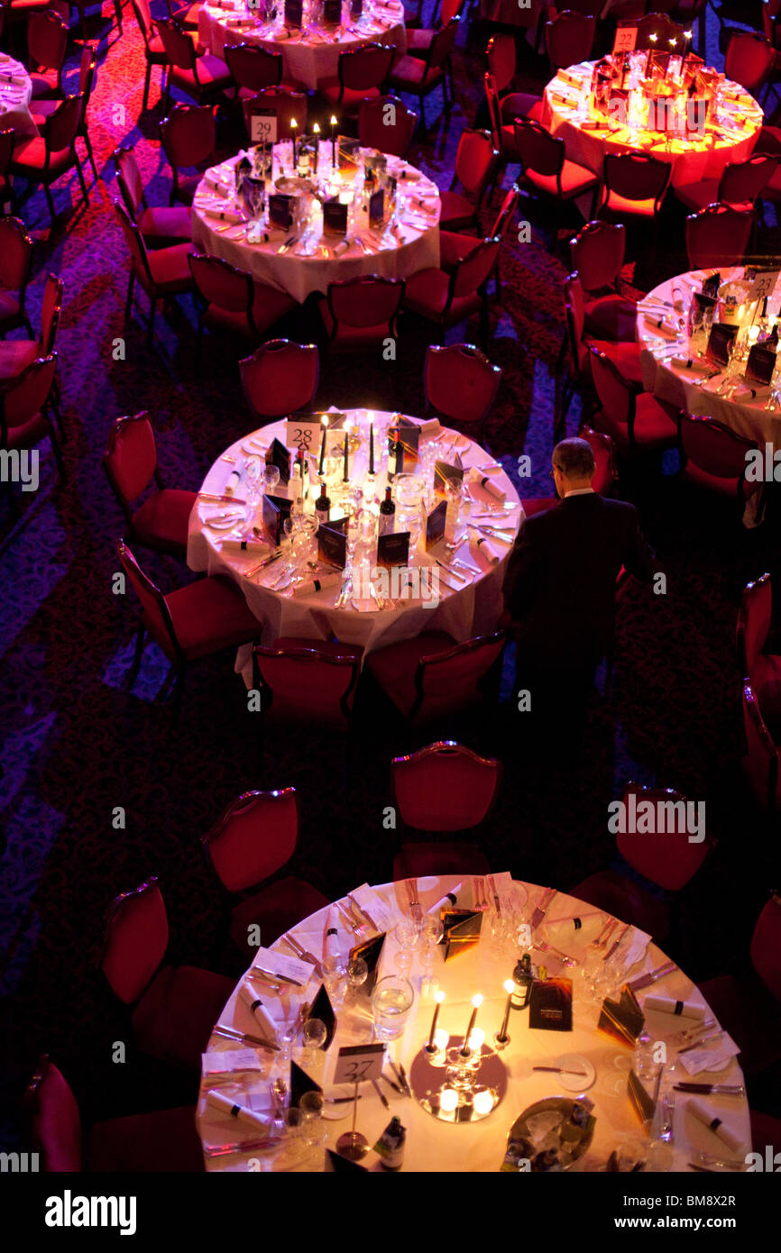 waiter preparing tables for dinner at awards ceremony Stock Photo - Alamy