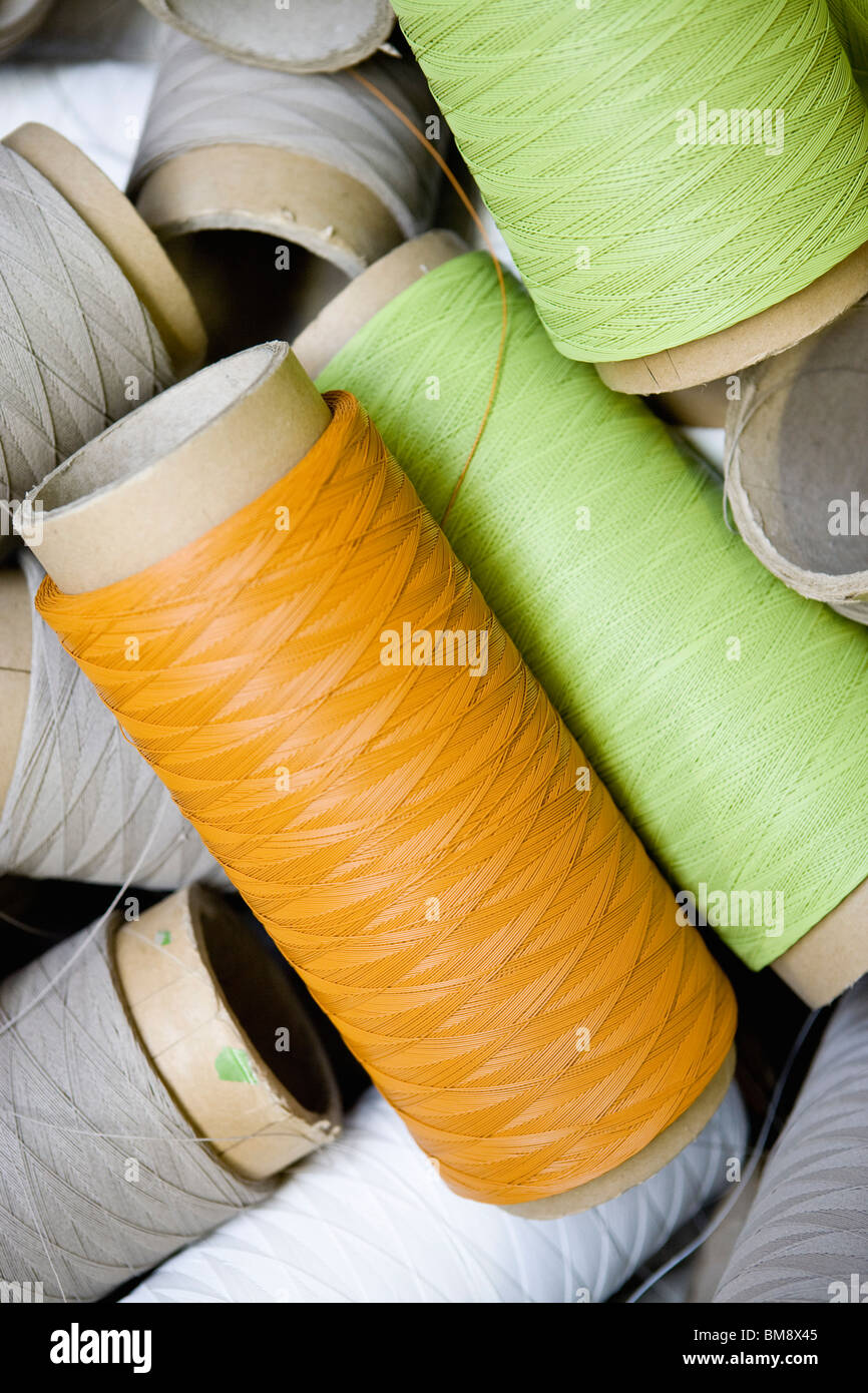 Recyclable composite textile fabrication department of factory, reels ...
