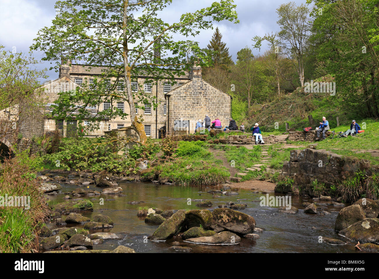Walkers at Gibson Mill by Hebden Water in Hardcastle Crags, Hebden Dale ...
